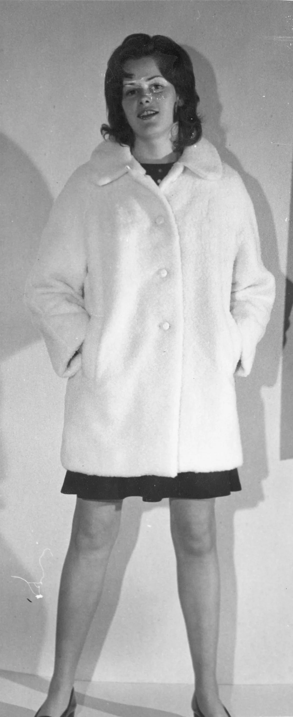 Coat fashions 4; Julie Bold in winter coat. | Record | DigitalNZ