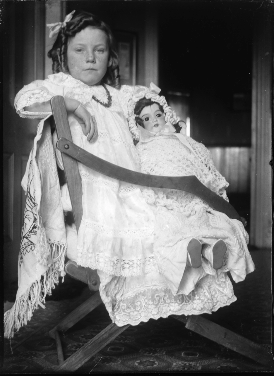 Girl with a doll | Record | DigitalNZ