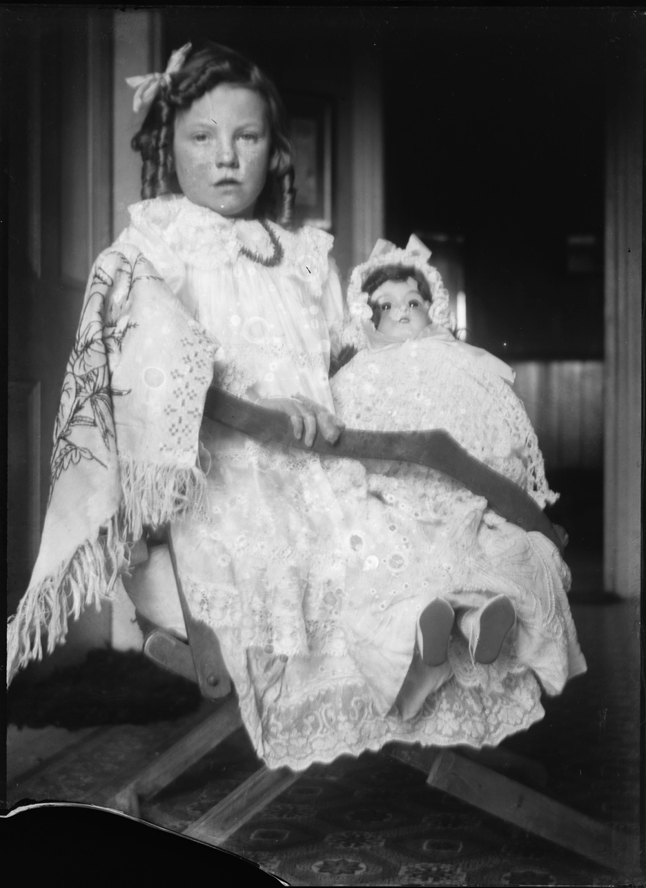 Girl with a doll | Record | DigitalNZ