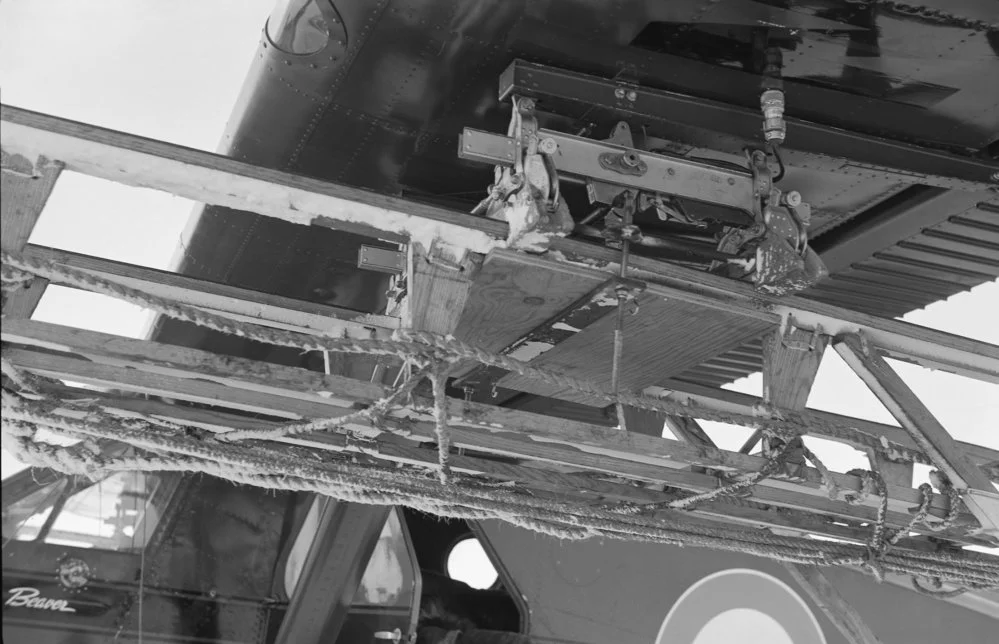 Sledge and attachment fitted to RNZAF Beaver supply dropping racks ...