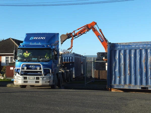 Digger loading container | Record | DigitalNZ