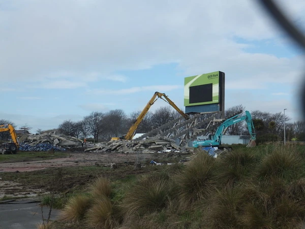 Excavators with QEII Park sign | Record | DigitalNZ