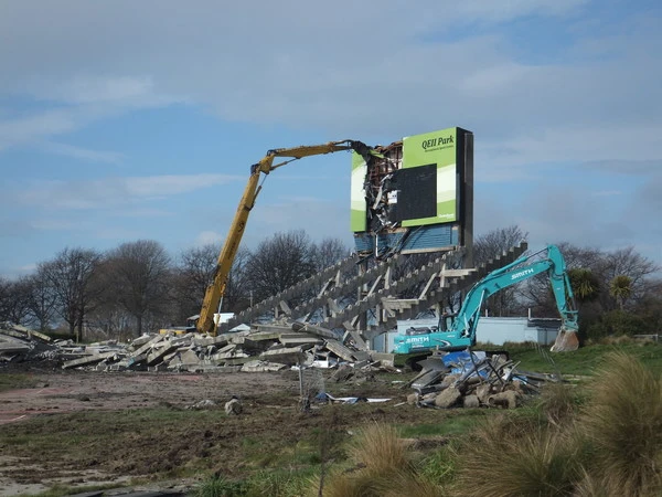 Two excavators by the QEII sign | Record | DigitalNZ