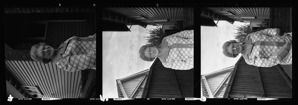 Betty Ashdown outside a house | Record | DigitalNZ