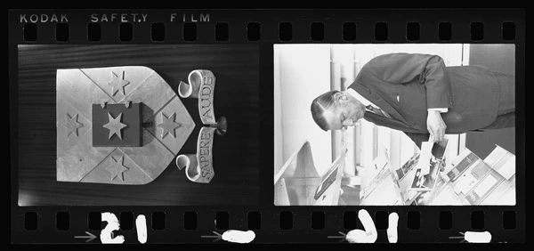 Professor Rolleston reading, and coat of arms | Record | DigitalNZ