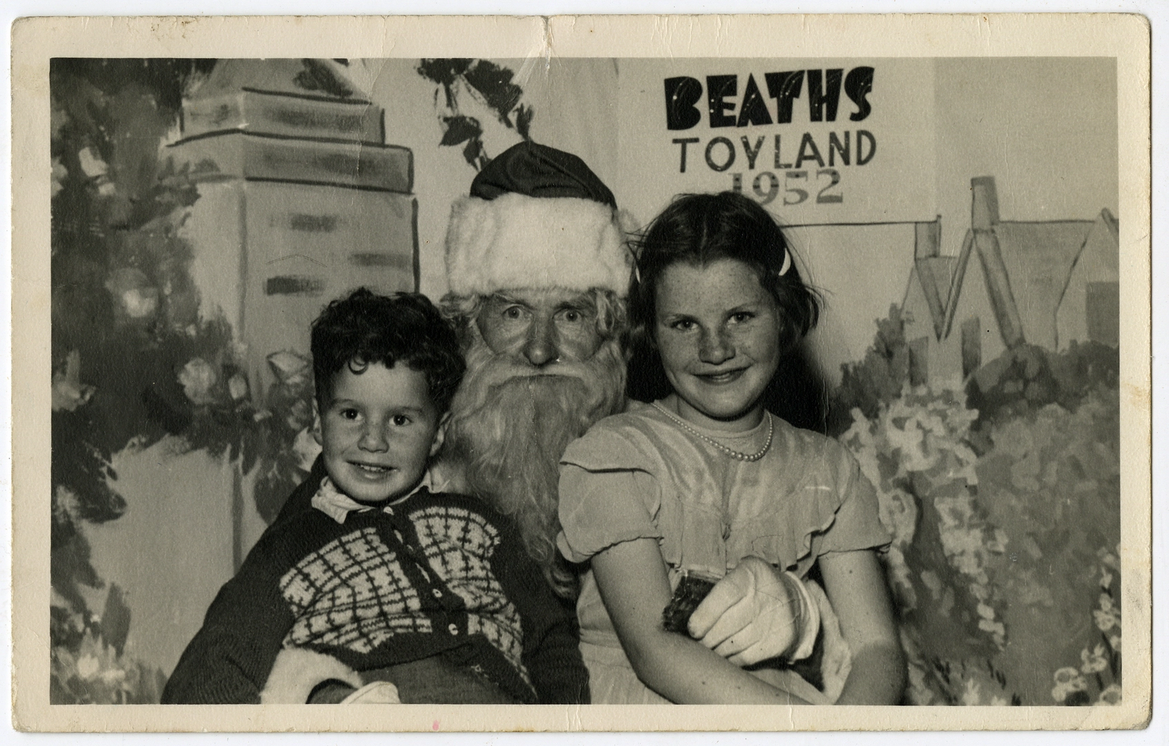 Colleen and Gavin Stevens with Santa at Beaths. | Record | DigitalNZ