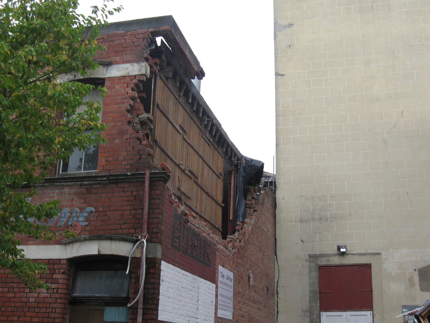 Collapsed brick wall on Sammy's Jazz Review building | Record | DigitalNZ