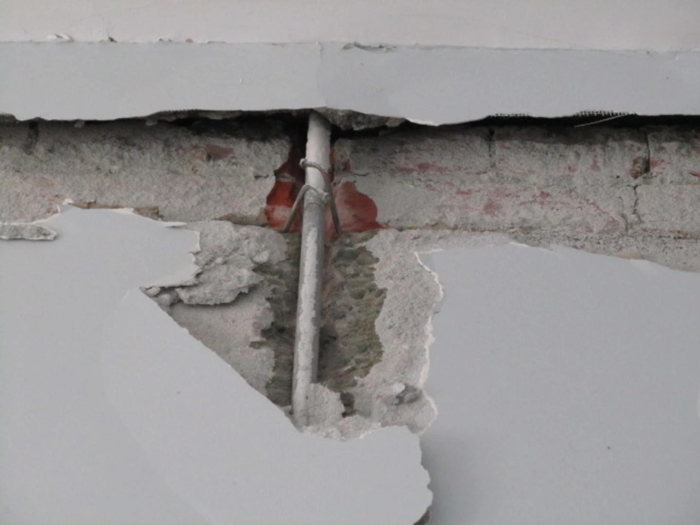 Exposed pipe in a wall | Record | DigitalNZ