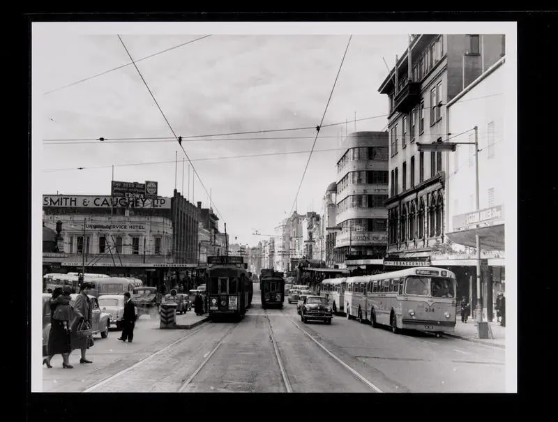 Trams, buses and trolley buses on Queen Street | Record | DigitalNZ