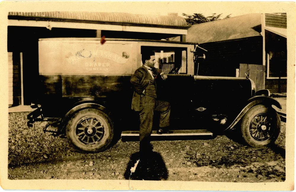 Hallam Isaac - Hawker with his drapery company van | Record | DigitalNZ