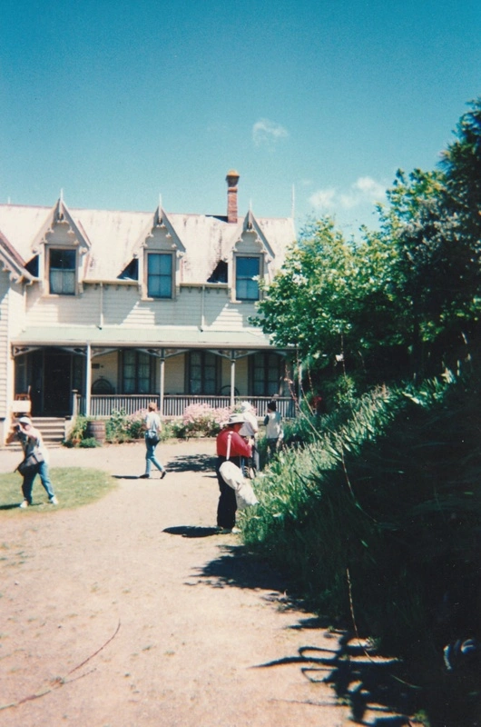 Visitors on the driveway to Puhinui at the Howick Historical Village. | Record | DigitalNZ