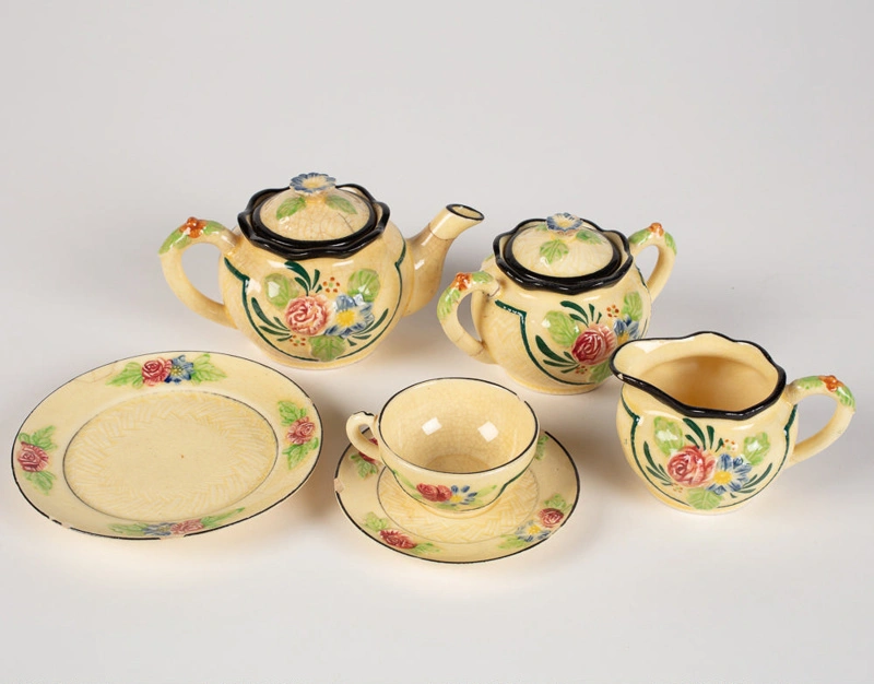 Toy Tea Set, Yellow Ceramic | Record | DigitalNZ
