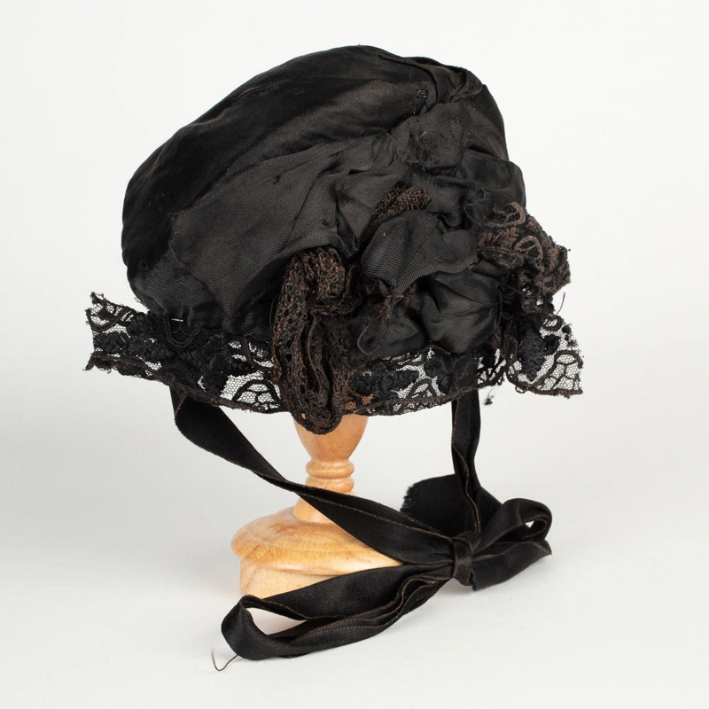 Bonnet, Black Victorian-style Bonnet on Navy Blue Base | Record | DigitalNZ