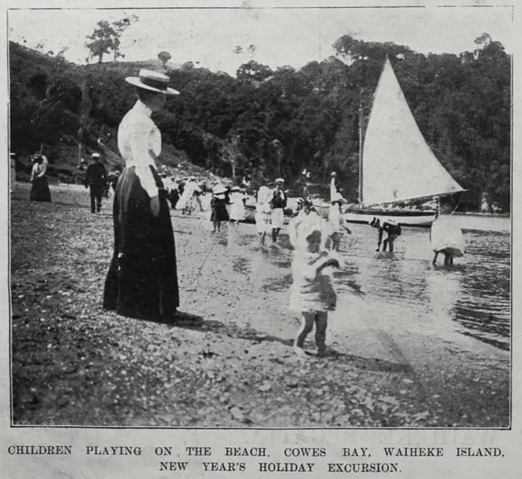 Children playing on the beach at Cowes Bay, Waiheke Island, New Year's ...