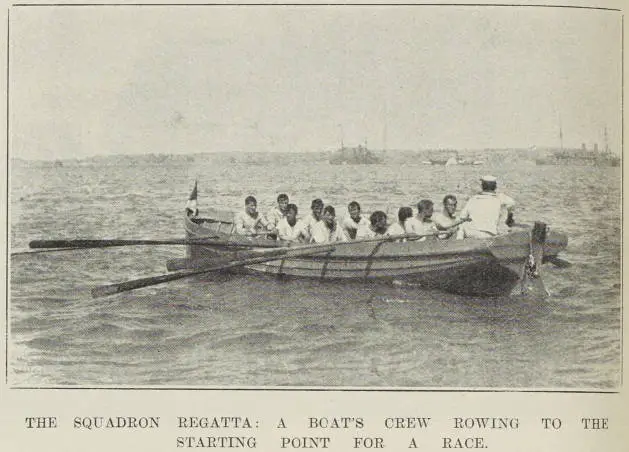 The squadron regatta: a boat's crew rowing to the starting point for a ...