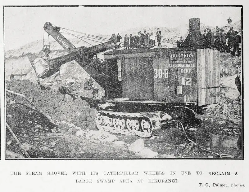 The steam shovel with its caterpillar tracks in use to reclaim a large ...