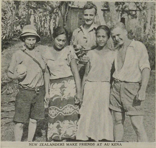 Three men from the Cap Pilar posing with two Gambier Island women during the visit to Au Kena ...