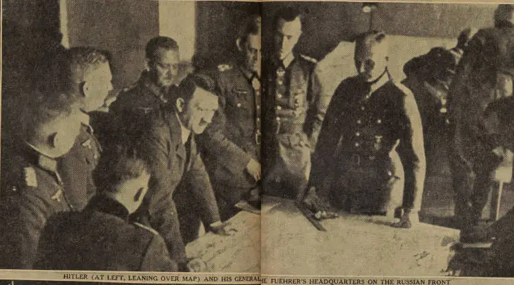 Hitler (at left, leaning over map) and his generals at the Fuehrer's ...