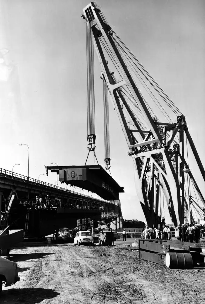 Attaching an extension to the southern anchorage. | Record | DigitalNZ