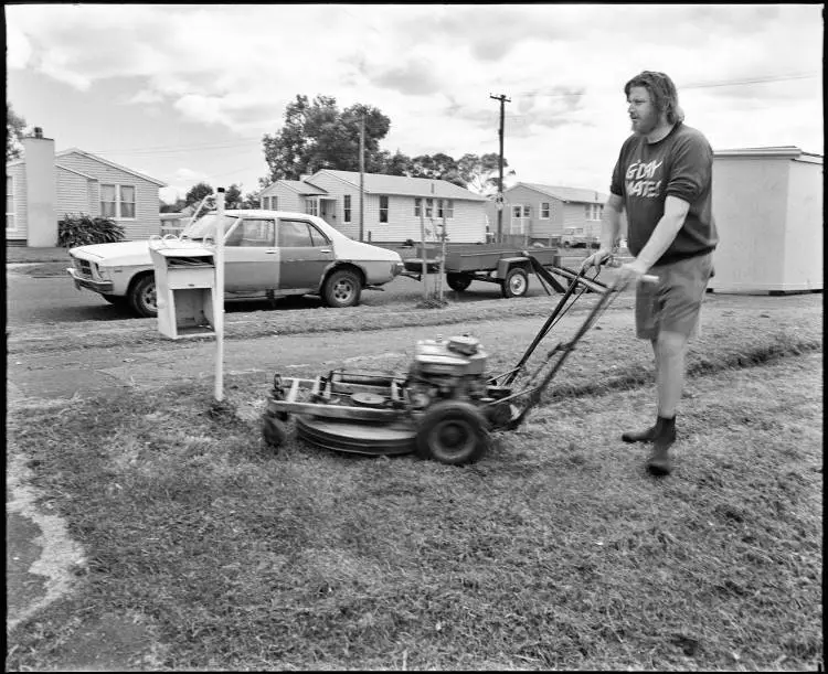 Steve Fenton mowing lawns, Glen Innes, 1989 | Record | DigitalNZ