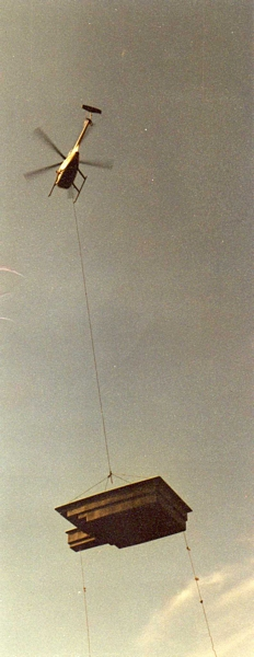 Helicopter delivering swimming pool | Record | DigitalNZ