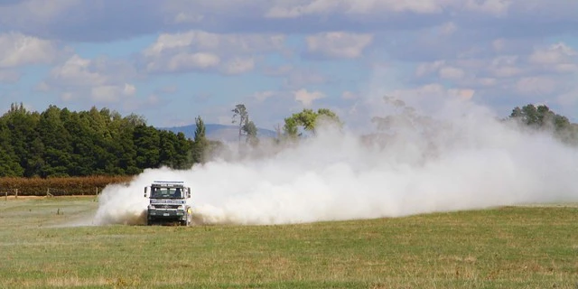 A cloud farm, Ngarua, Waikato, New Zealand (Spreading fertilizer ...