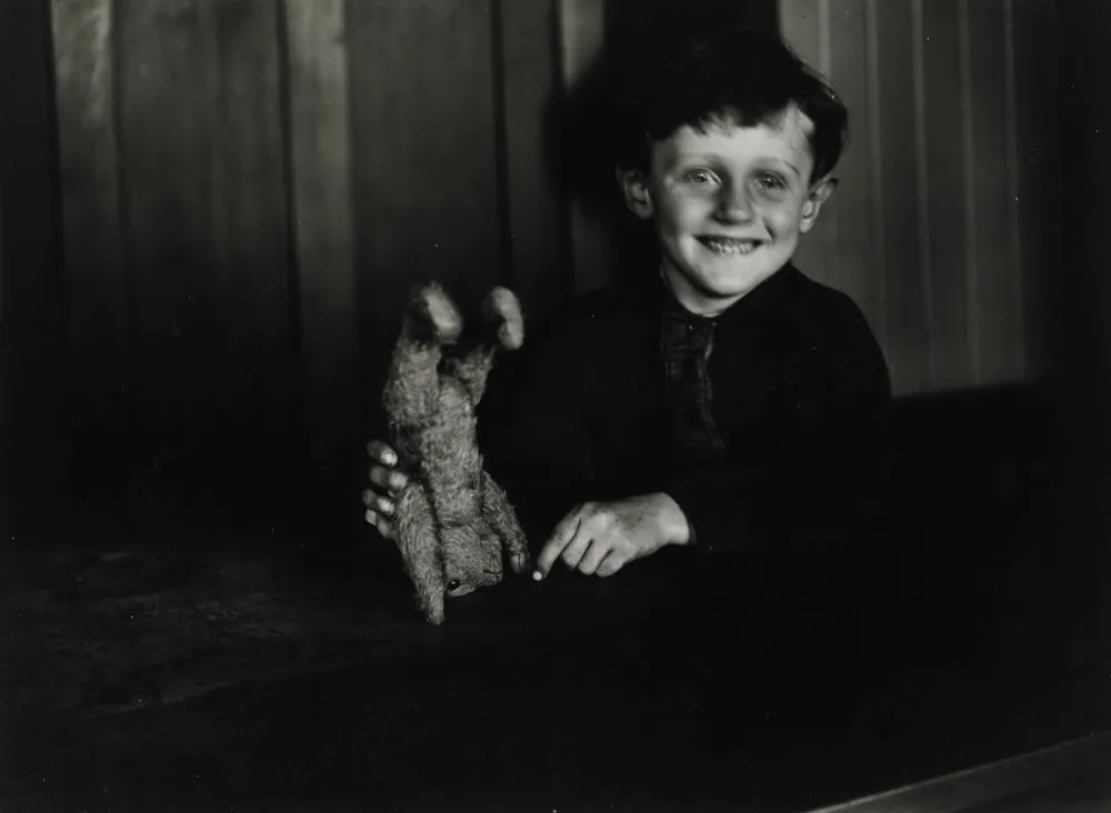 Clyde holding a teddy bear | Record | DigitalNZ