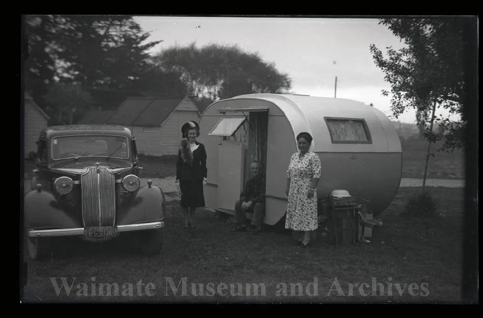 Bowden family beside a caravan | Record | DigitalNZ