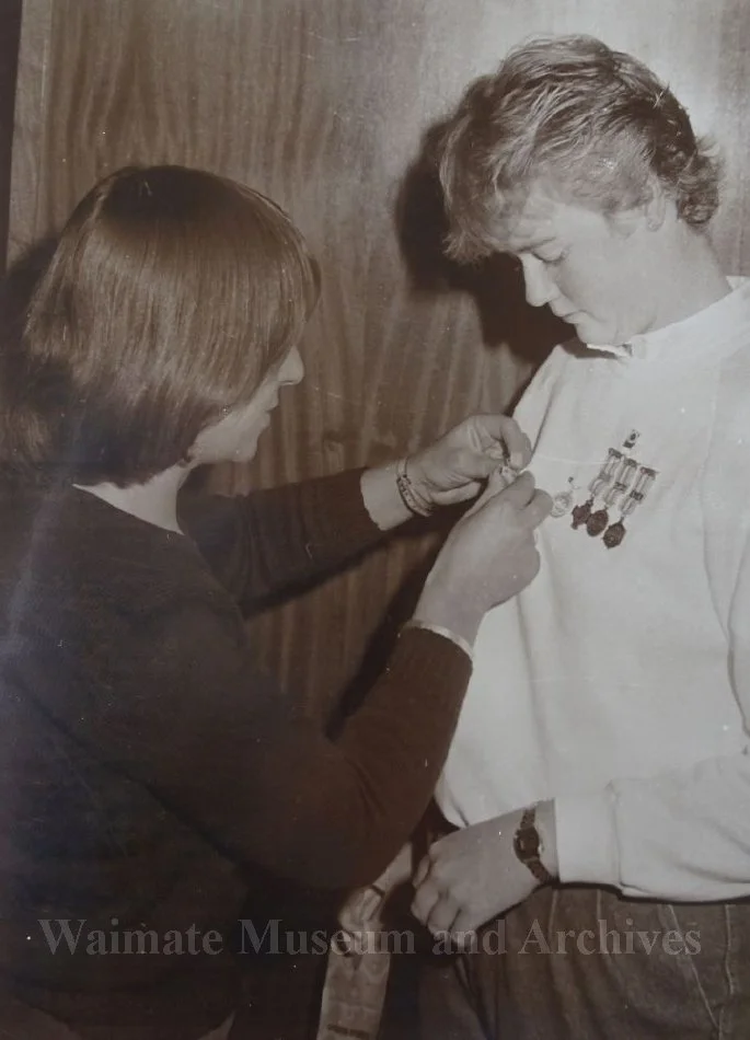 Linda Campbell (?) being presented with a badge | Record | DigitalNZ