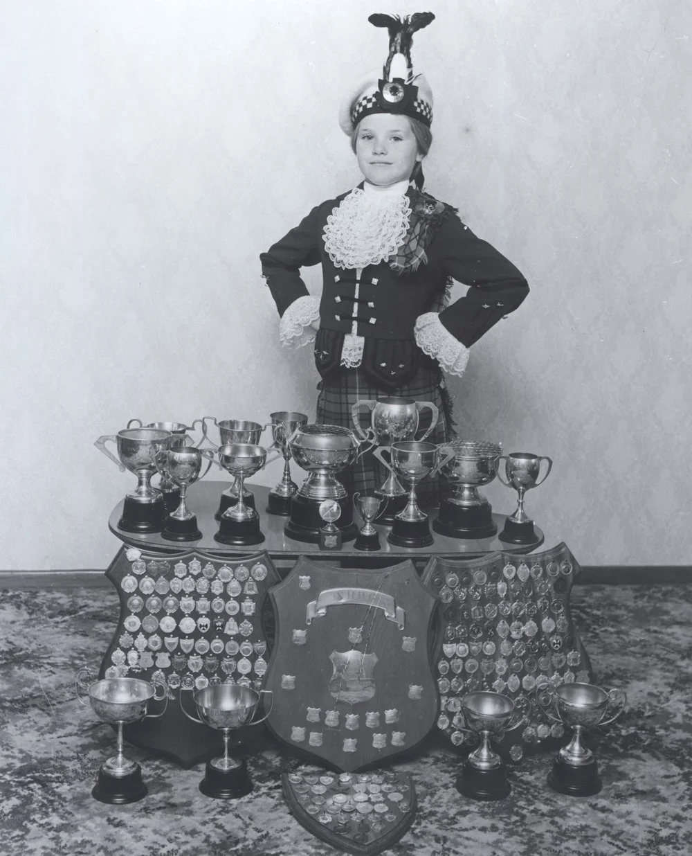 Tracey Watson with Highland dancing trophies. [P3-307-1382] | Record ...