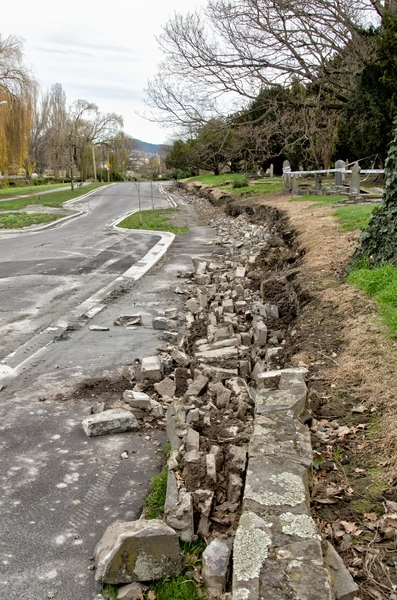 Barbadoes Street Cemetery fallen stone wall | Record | DigitalNZ