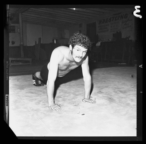 Boxer Billy Bell doing push ups | Record | DigitalNZ